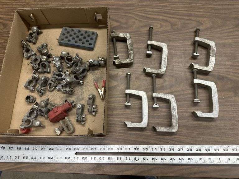 Topper clamps and battery terminal clamps - Legacy Auction Company