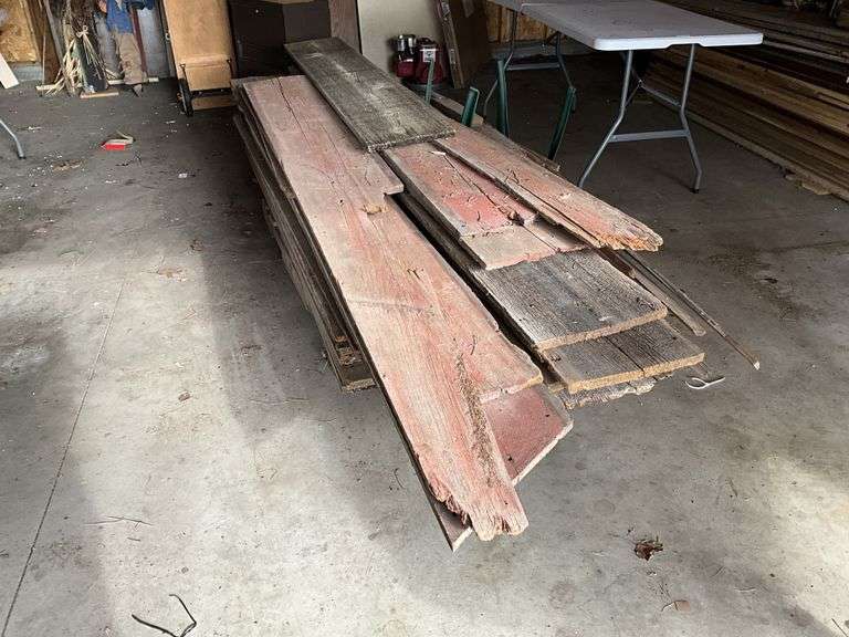 Pile of barn boards - Legacy Auction Company