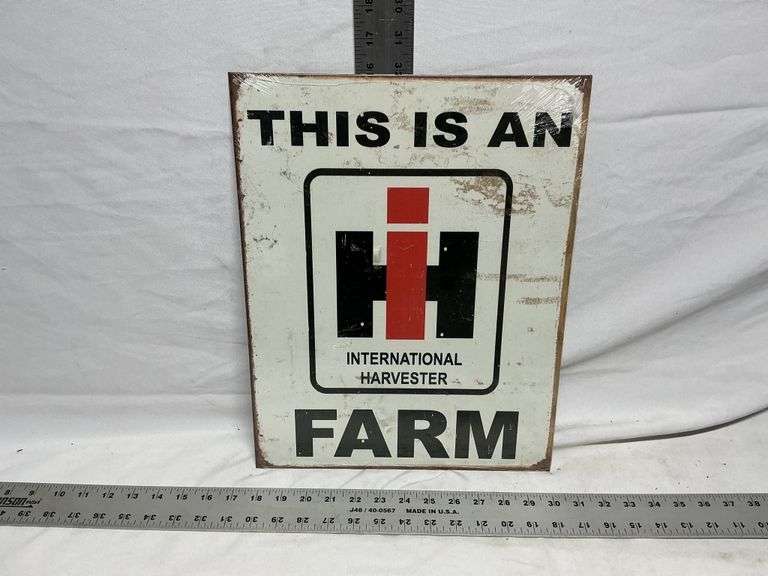 IH tin sign - Legacy Auction Company