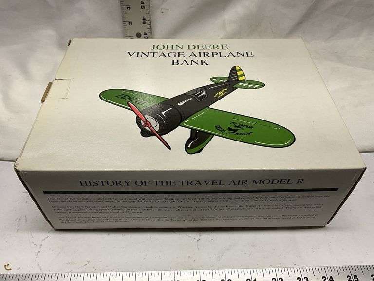 John Deere vintage airplane bank - Legacy Auction Company