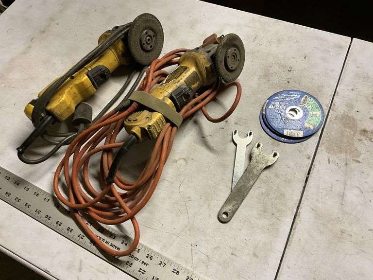 2-4 1/2 angle grinders with masonry cutting discs - Legacy Auction Company