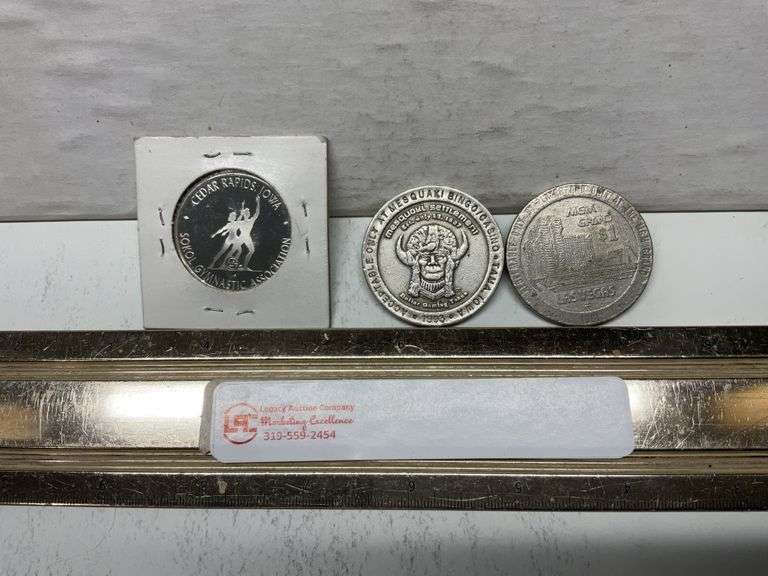 Cedar Rapids Iowa Sokol gymnastic token, and $1 - Legacy Auction Company