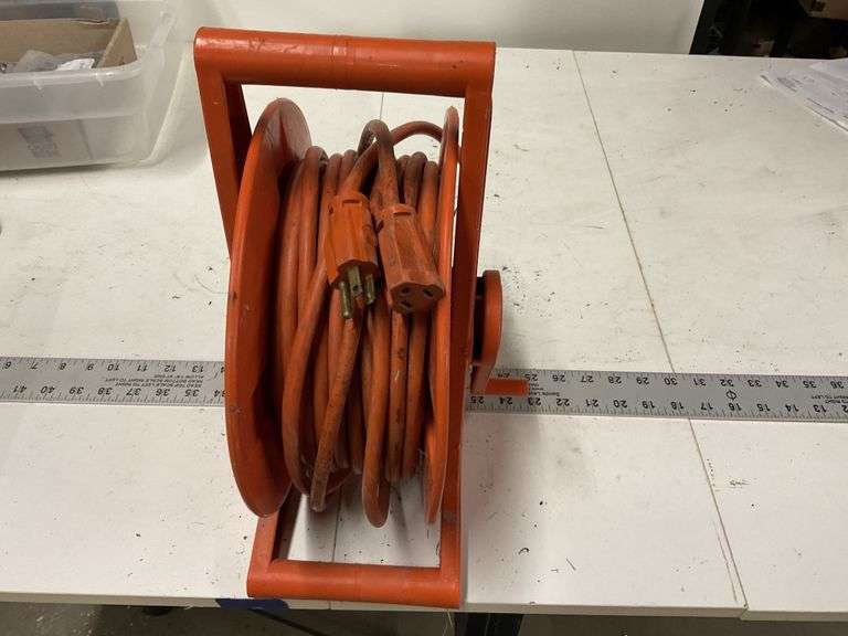 50 foot drop cord and hand reel - Legacy Auction Company