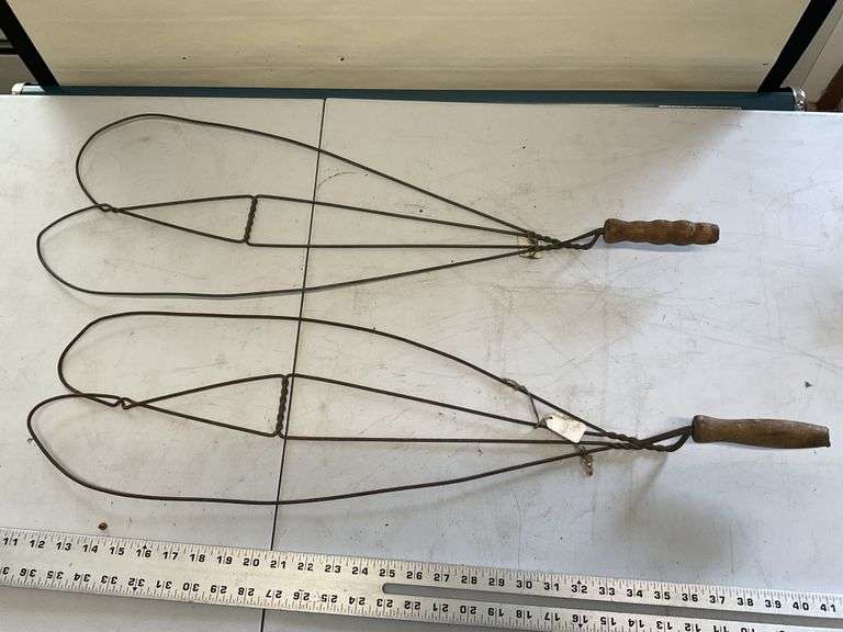 Rug beaters - Legacy Auction Company