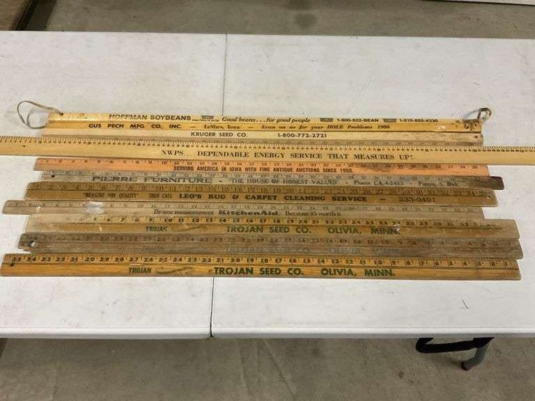 Assorted measuring sticks - Legacy Auction Company