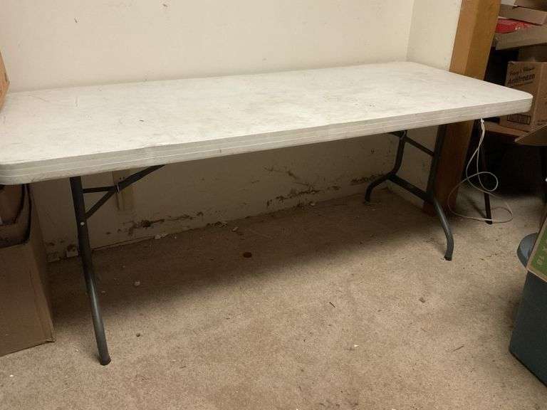 6’ x 30" folding table - Legacy Auction Company