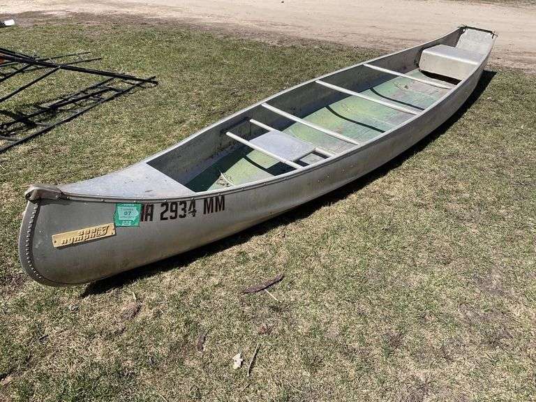 16’ Sea Nymph canoe, w/ reg. , 2- paddles w/ - Legacy Auction Company