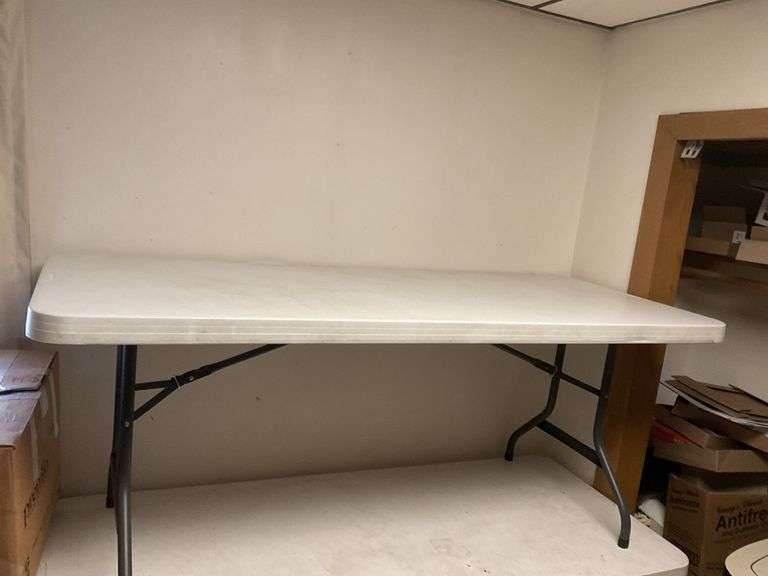 6’ x 30" folding table - Legacy Auction Company