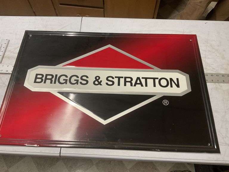 Briggs and Stratton metal sign - Legacy Auction Company