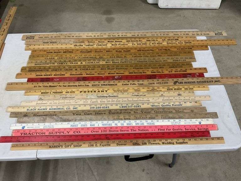 Assorted measuring sticks - Legacy Auction Company