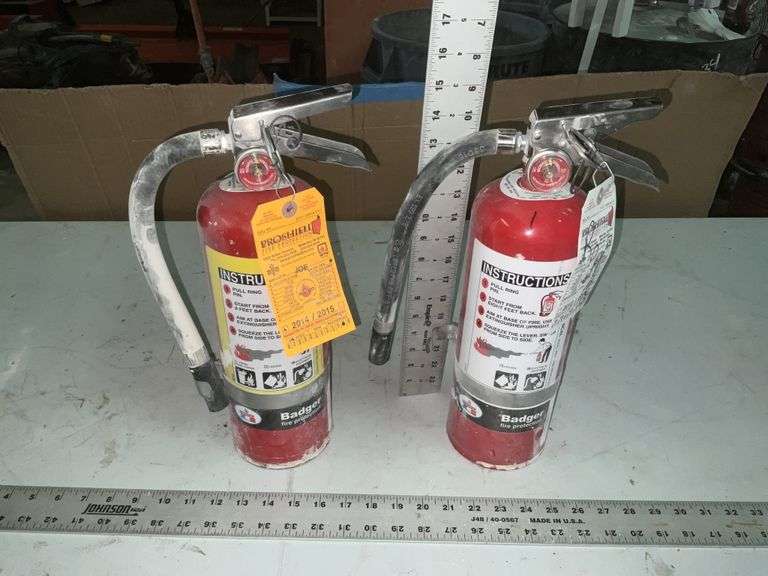 2 Badger fire extinguishers - Legacy Auction Company