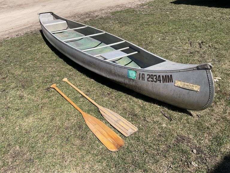 16’ Sea Nymph canoe, w/ reg. , 2- paddles w/ - Legacy Auction Company