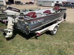 1990 Lund Rebel Special 16’ boat w/ Shorelander - Legacy Auction Company