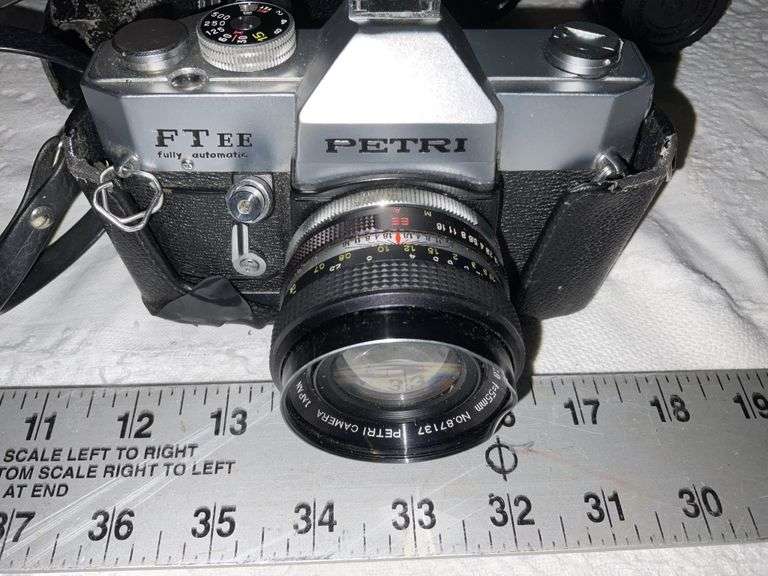 Petri Camera with tripod and 3 lenses - Legacy Auction Company