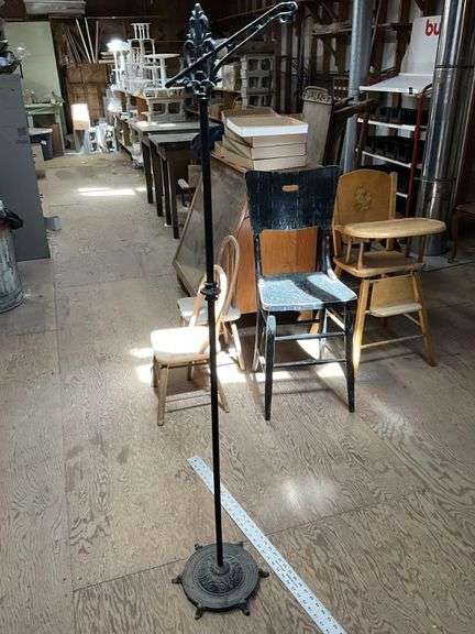 Cast iron stand - Legacy Auction Company