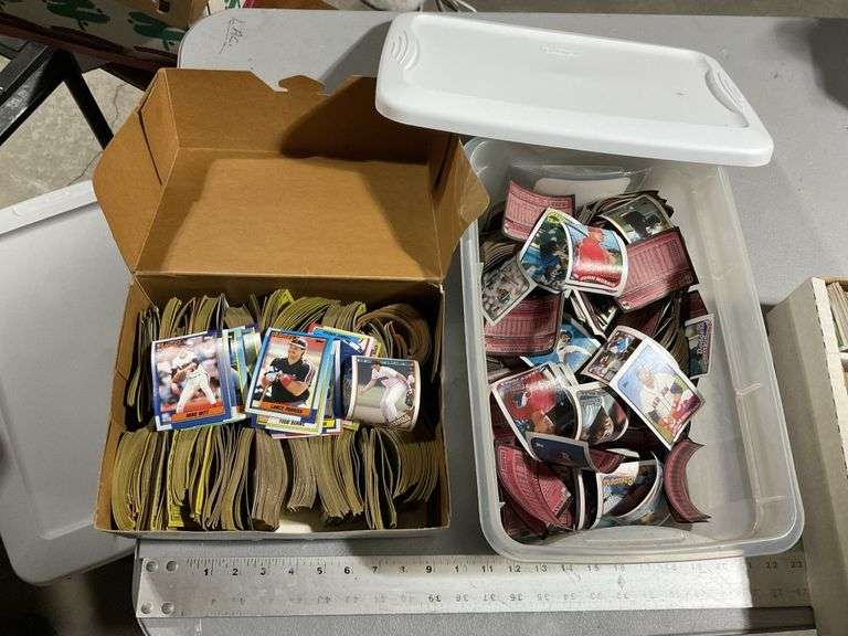 Tote and box with damaged baseball cards - Legacy Auction Company