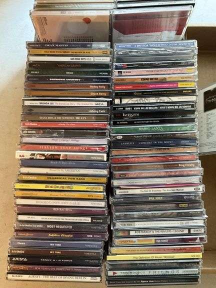 CDS, most are still sealed - Legacy Auction Company