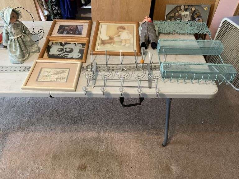 Dolls, pictures, clothing racks and miscellaneous - Legacy Auction Company