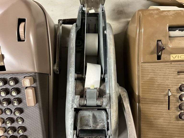 Vintage adding machines, tape dispenser - Legacy Auction Company