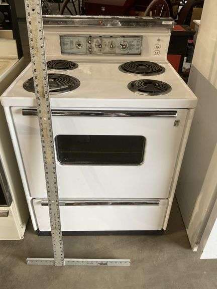 General electric electric stove - Legacy Auction Company