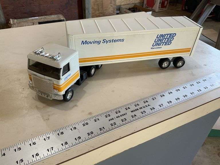 United, moving semi - Legacy Auction Company