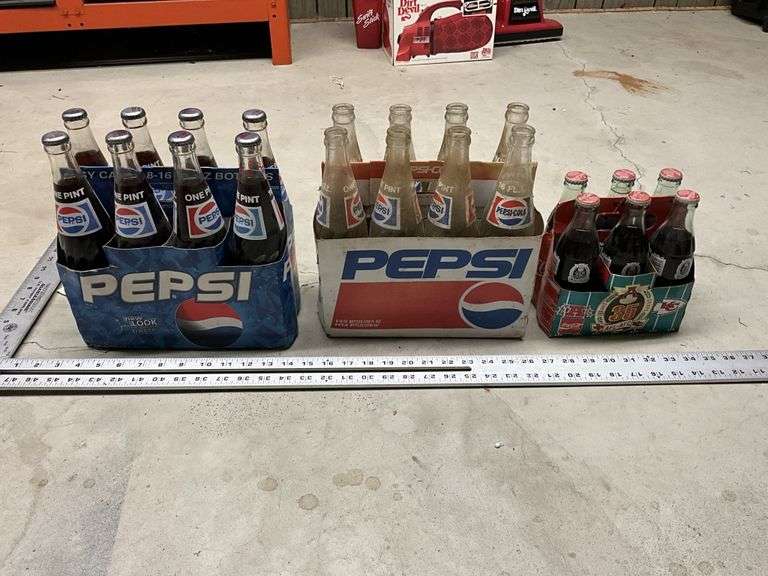 Pepsi and Coke bottles - Legacy Auction Company