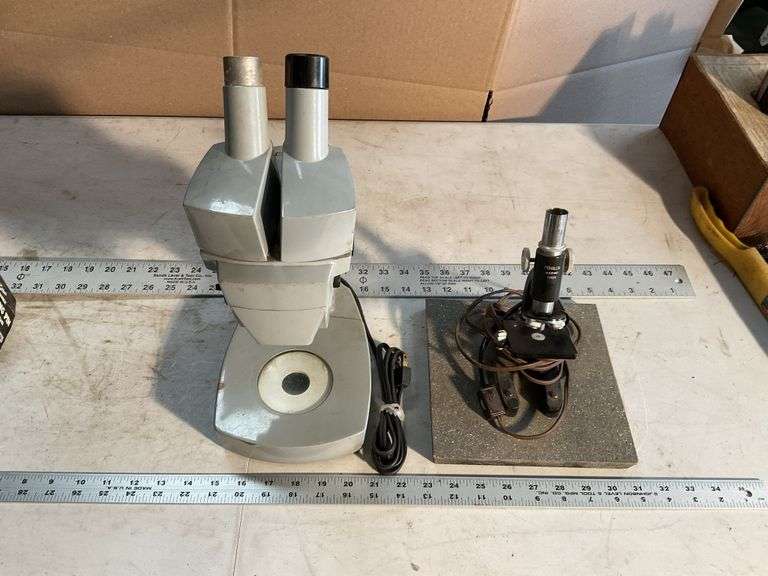 2 microscopes - Legacy Auction Company