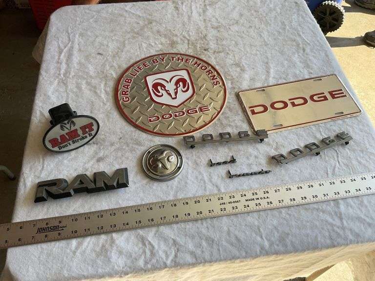 Dodge metal signs, emblems, etc. - Legacy Auction Company