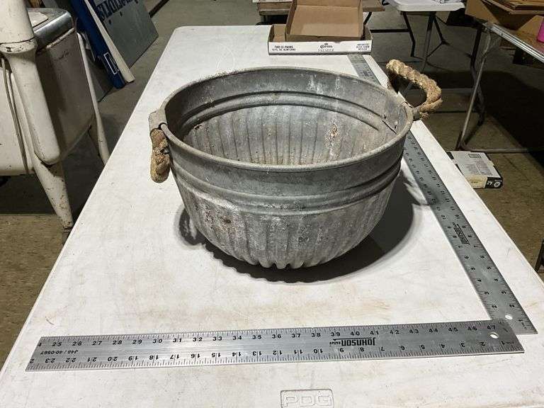 Galvanized pail with rope handles - Legacy Auction Company