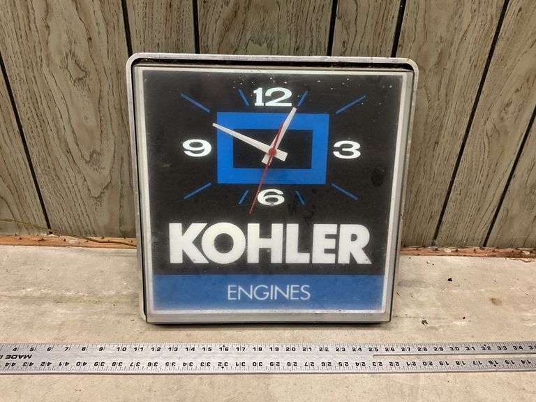 Kohler Engines lighted clock, clock needs work! - Legacy Auction Company