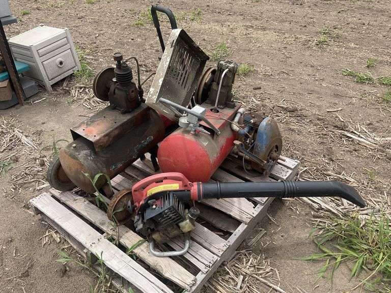 Pallet with parts, air compressors, leaf blower - Legacy Auction Company