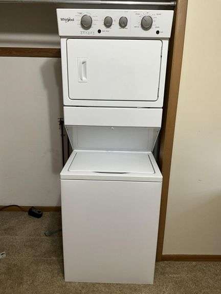 Whirlpool stackable washer/dryer, on main floor! - Legacy Auction Company