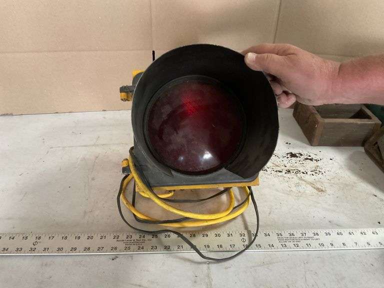 Red signal light - Legacy Auction Company