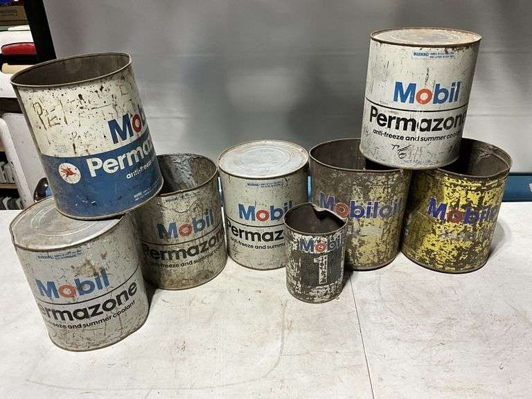 Mobil Oil open cans - Legacy Auction Company