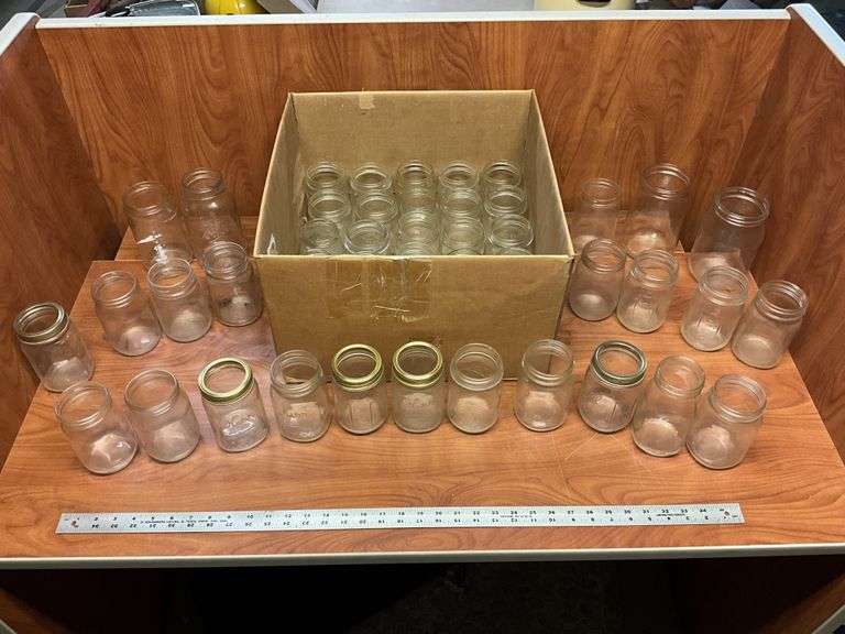 Assorted pint and quart jars - Legacy Auction Company