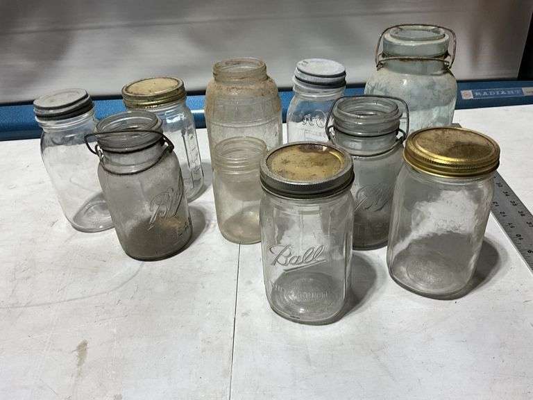 Misc jars with wood crate - Legacy Auction Company