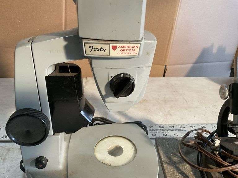 2 microscopes - Legacy Auction Company