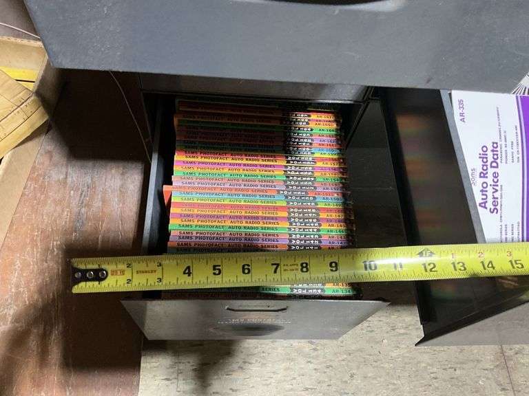 3 filing cabinets with auto radio books - Legacy Auction Company