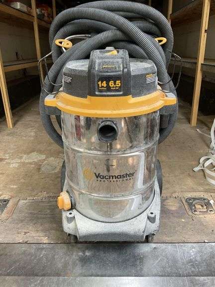 Vac master 14 gallon shop vac on wheels with - Legacy Auction Company