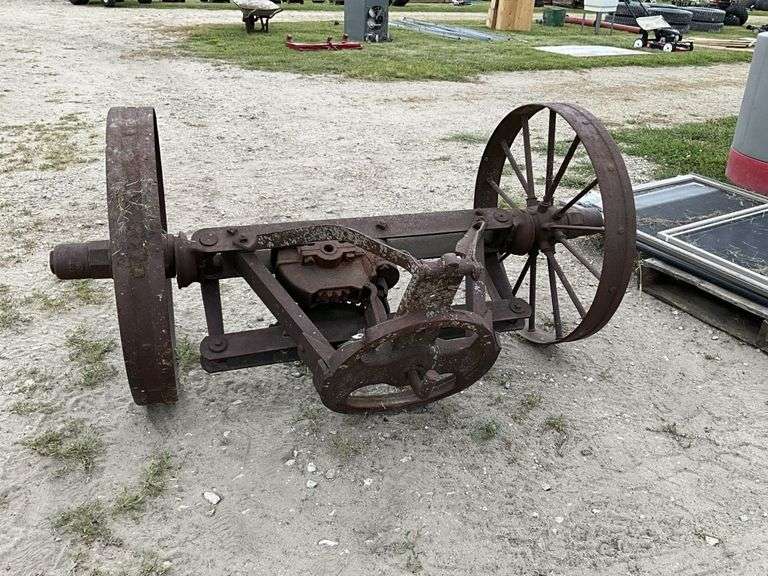 Steel wheels and axel - Legacy Auction Company