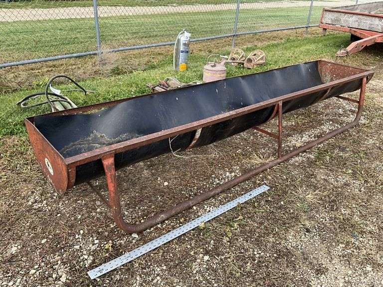 Metal and poly cattle bunk - Legacy Auction Company