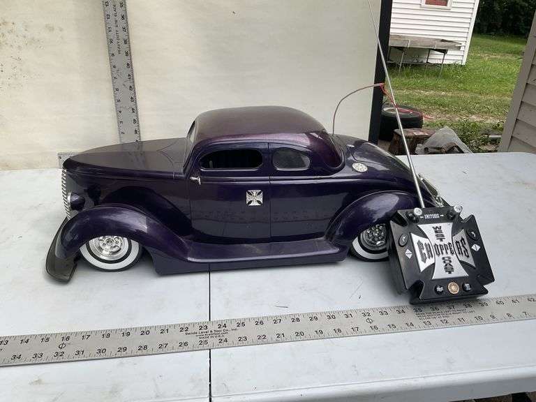 West Coast Choppers remote control and car. Does - Legacy Auction Company