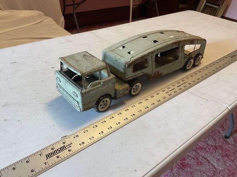 Vintage Structo car transport - Legacy Auction Company