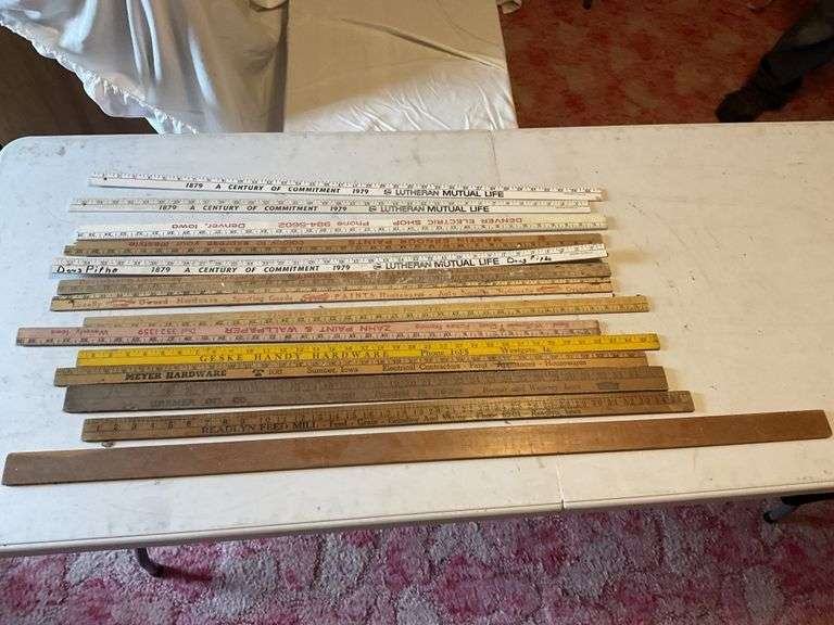 Measuring sticks - Legacy Auction Company