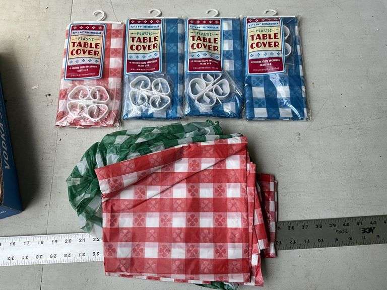 Tupperware, plastic tablecloths - Legacy Auction Company