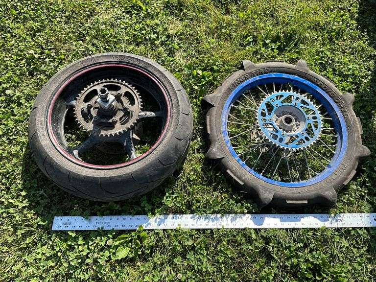 2 motorcycle rims and tires - Legacy Auction Company