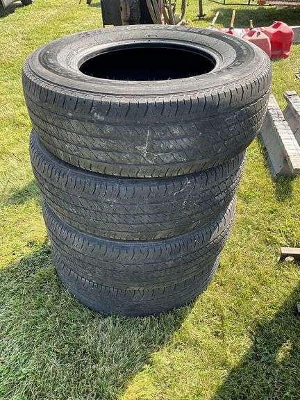 Bridgestone P255/7R 17 tires - Legacy Auction Company