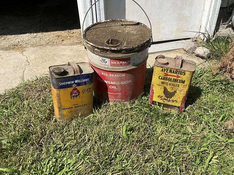 Fluid cans-full - Legacy Auction Company