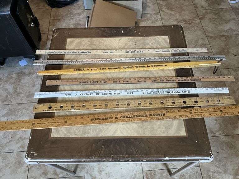 Measuring sticks - Legacy Auction Company