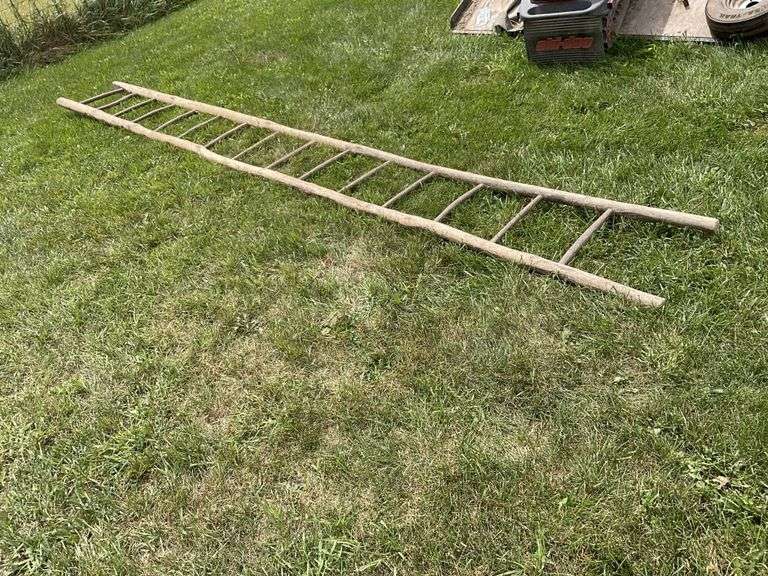 Vintage rustic log 16' ladder - Legacy Auction Company